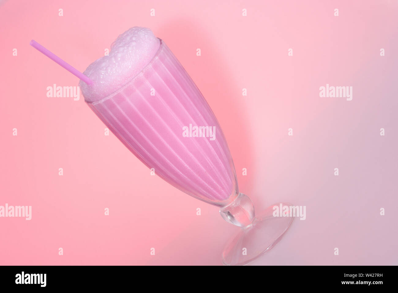 Natural faluda drink with stroke in glass, pink color cup and ...