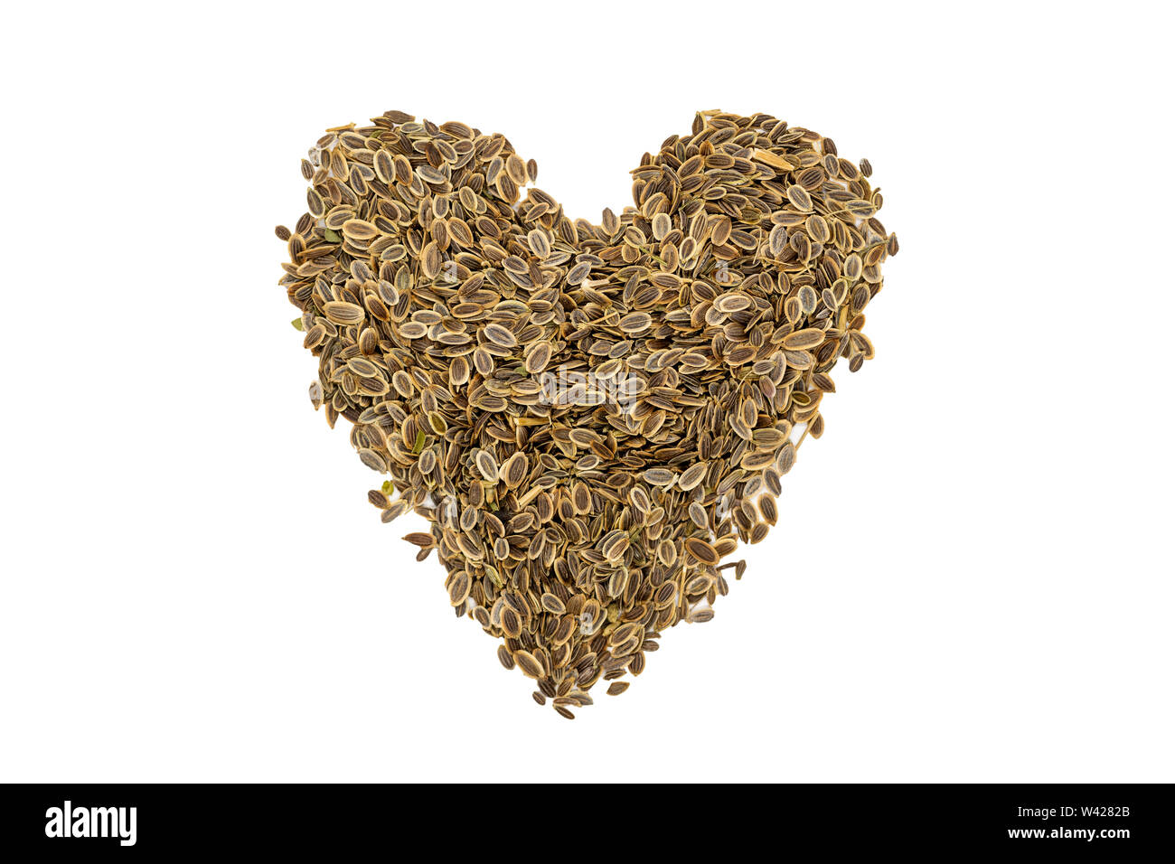 Dill seeds, heart-shaped, close up. Annual fennel herb used as spice in ...