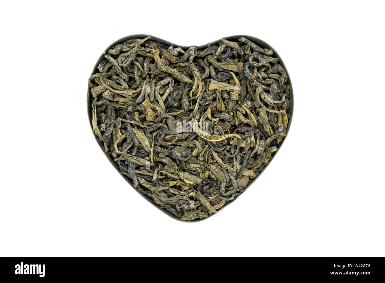 Huangshan Maofeng green tea, heart-shaped, close up, isolated. China ...