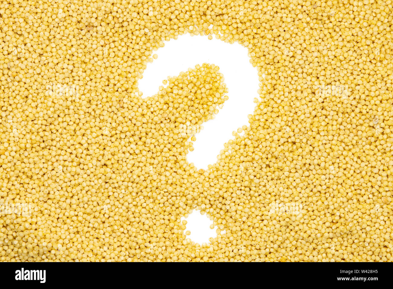 Millet groats, question mark, close up, top view. Gluten-Free and non ...