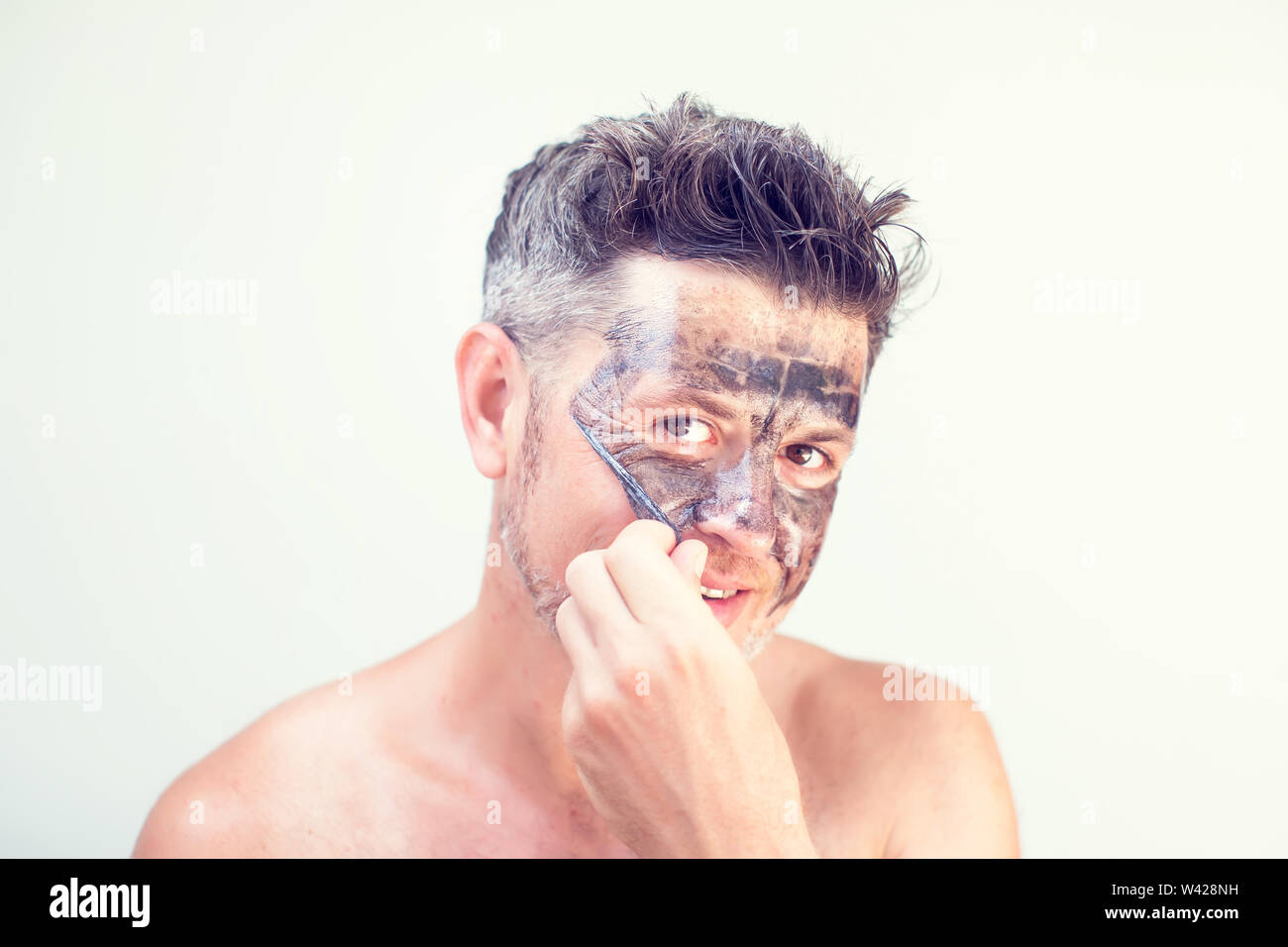 a Handsome man with black face mask on his face Stock Photo - Alamy