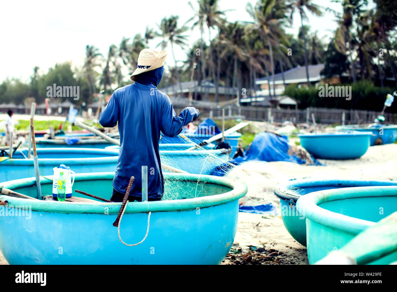 Fishermen on their boats after a night trip of fishing. fisher man ...