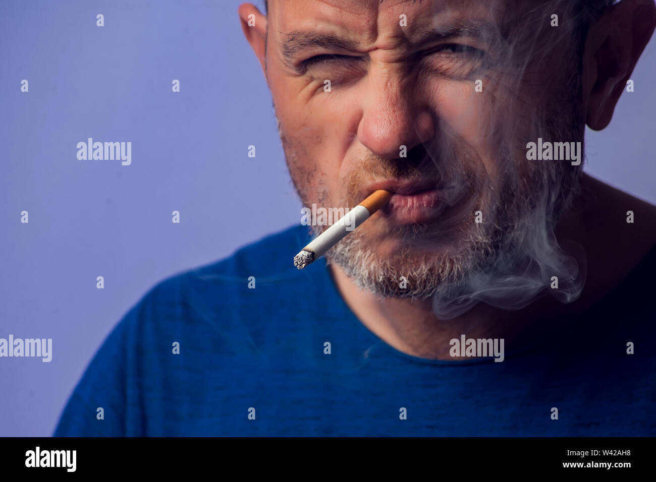 Close up of Man smoking cigarette. People, healt care concept Stock ...