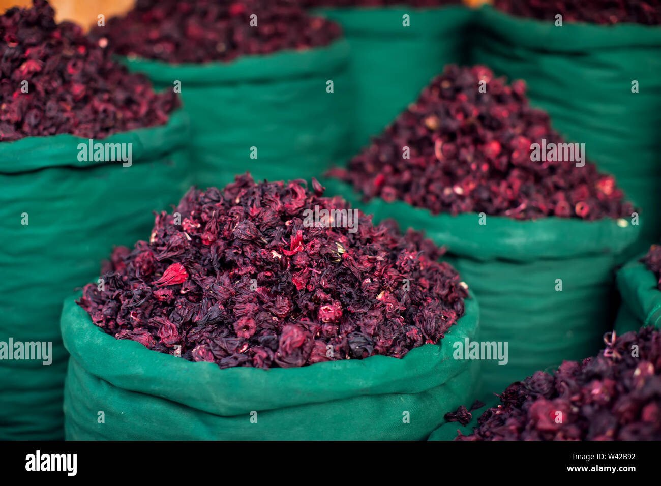 Dry herb hibiscus for tea in baskets. Arabic herbs on traditional ...