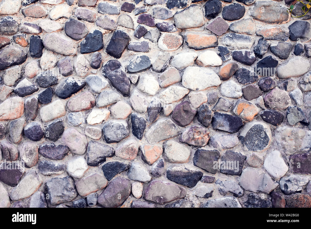 Natural colorful pebbles background on beach in summer for wall design ...