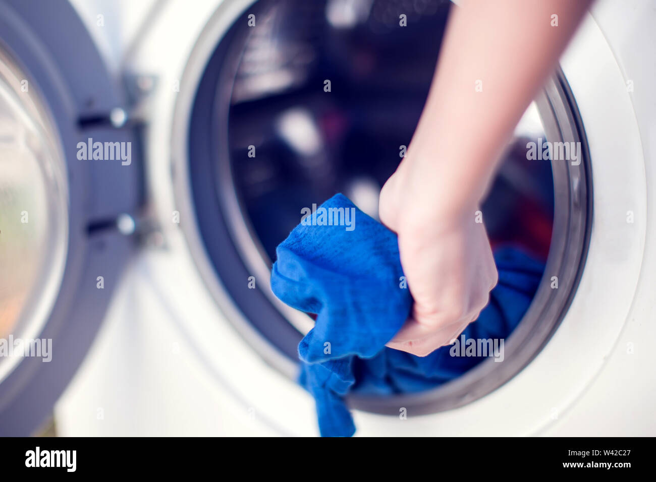 Dirty clothes in washing machine hi-res stock photography and images ...