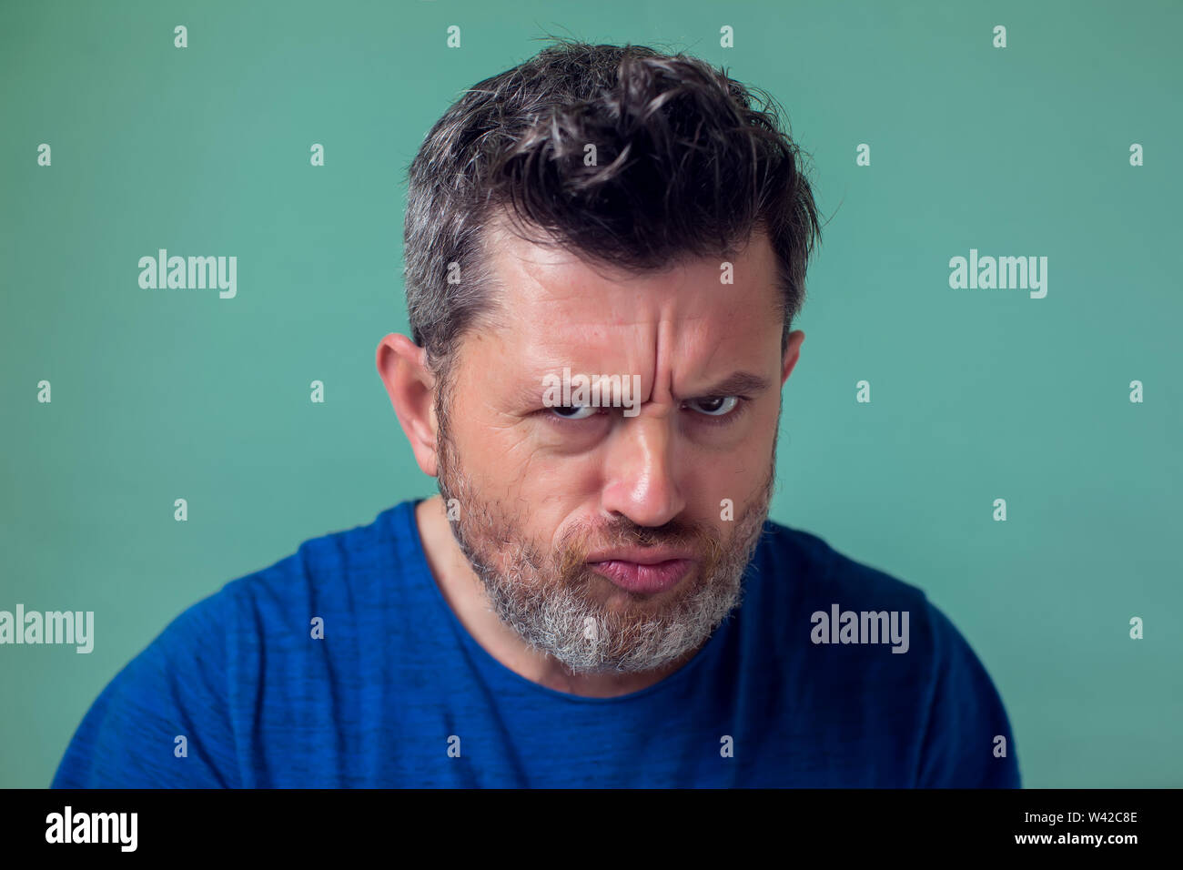 Angry man with beard hi-res stock photography and images - Alamy