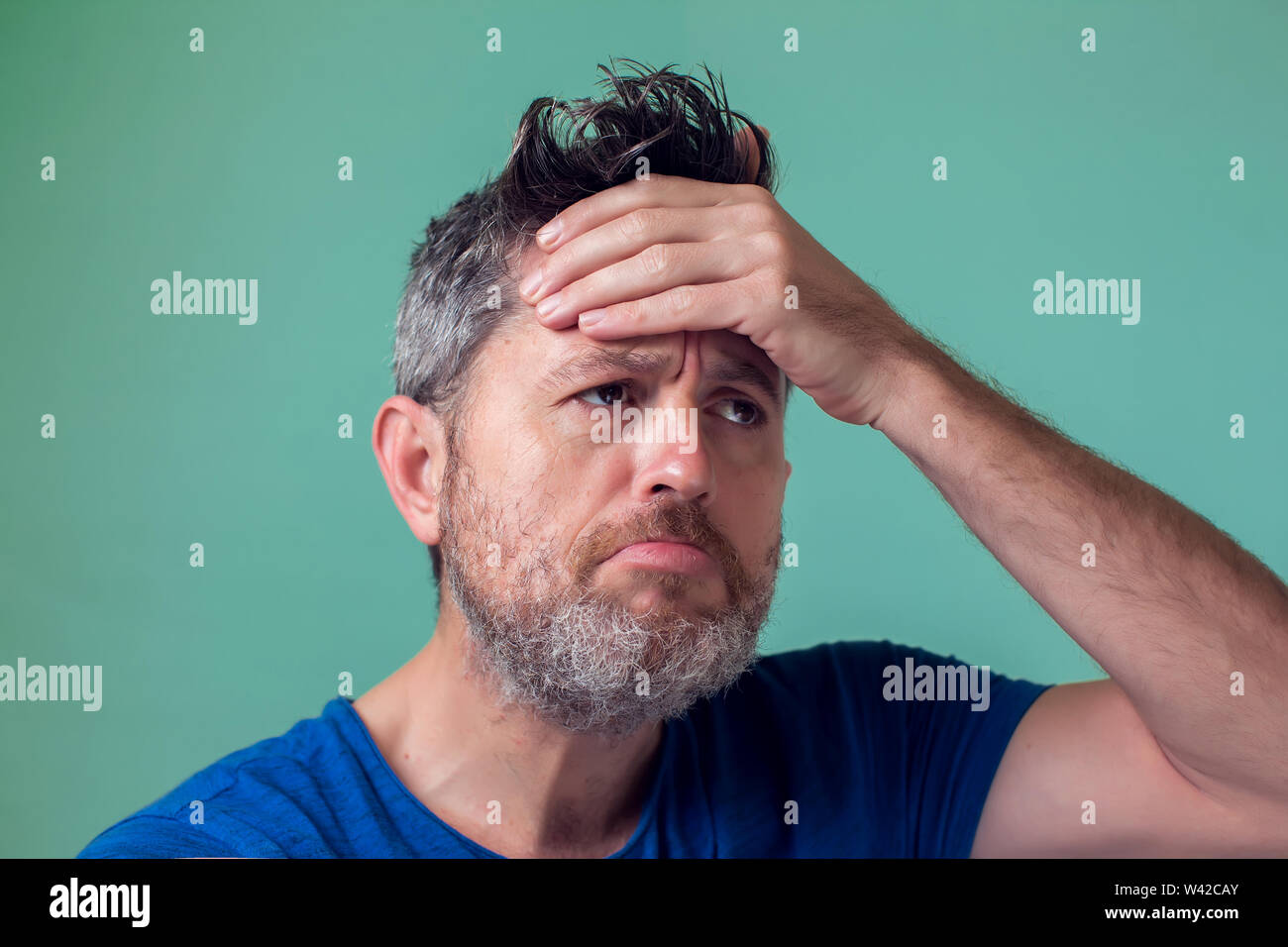 People and emotions - man with beard thinking about something Stock ...