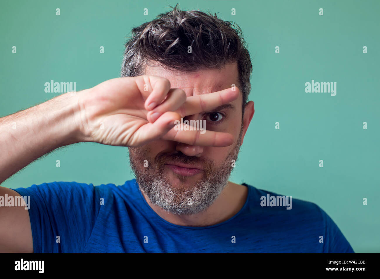 People and emotions - man with kind face and funne pose Stock Photo - Alamy