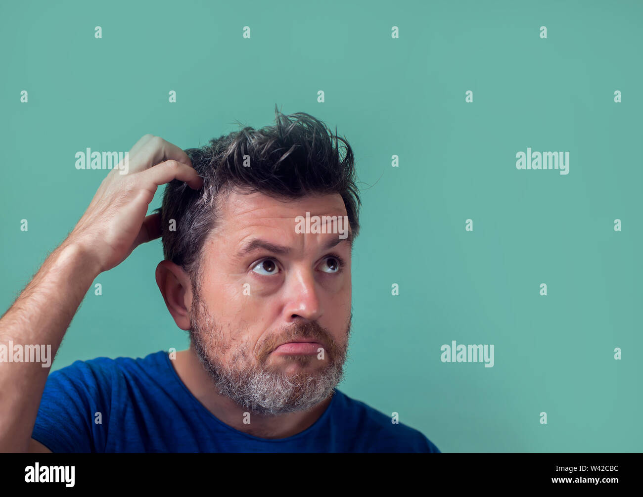 People and emotions - man with beard thinking about something Stock ...