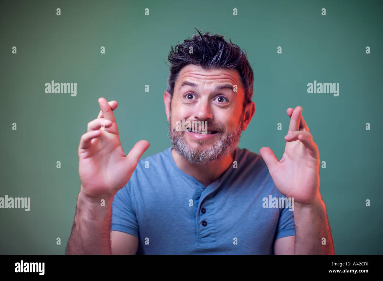 People and emotions - a portrait of man with beard in a pose of ...
