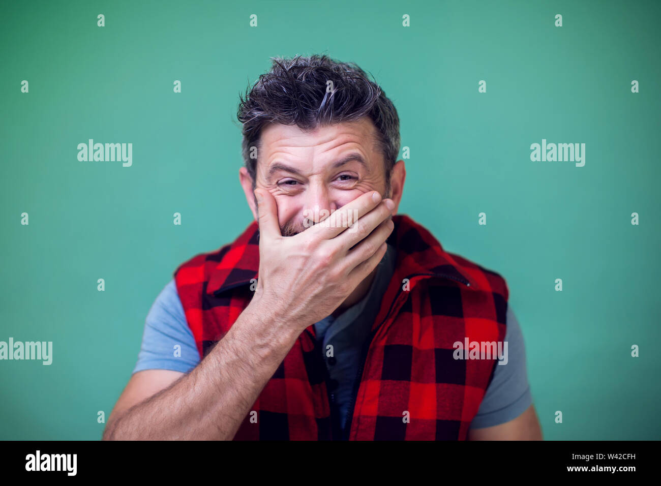 Serious and laughing face hi-res stock photography and images - Alamy