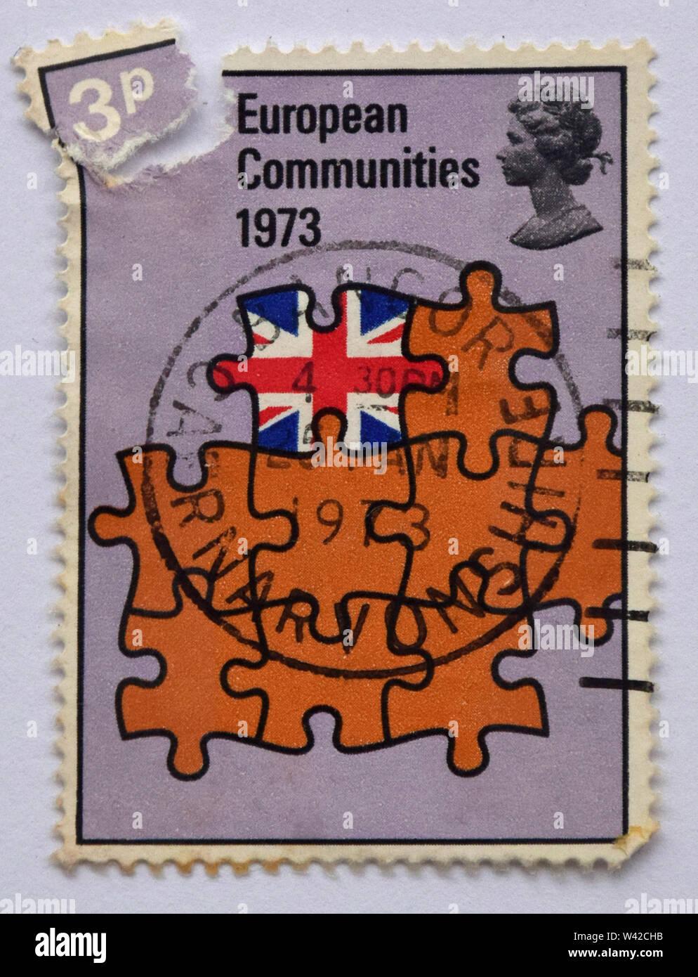 European Communities 1973 stamp franked torn Stock Photo - Alamy
