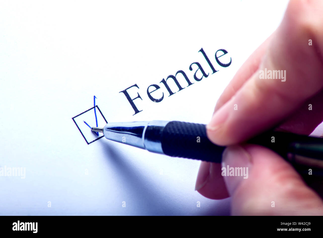 Female - checkbox with a cross on white paper. Checklist concept Stock ...