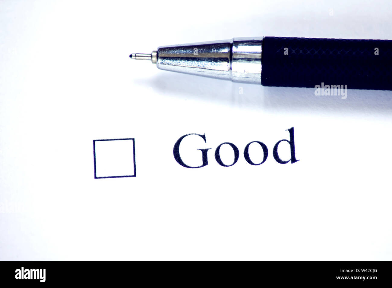 Checklist with a word Good on white paper with pen. Checkbox concept ...