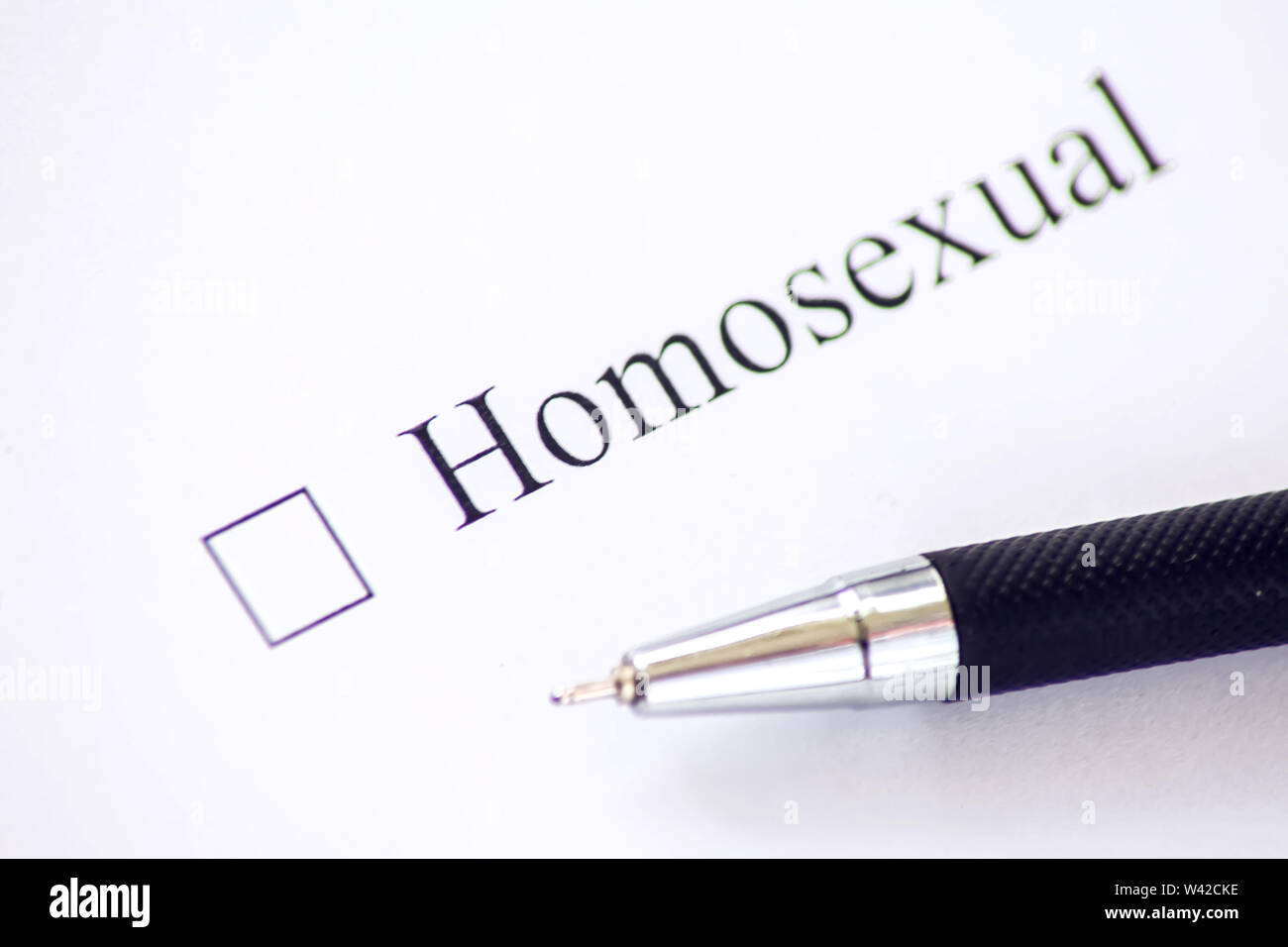 Checklist with a word Homosexual on white paper with pen. Checkbox ...