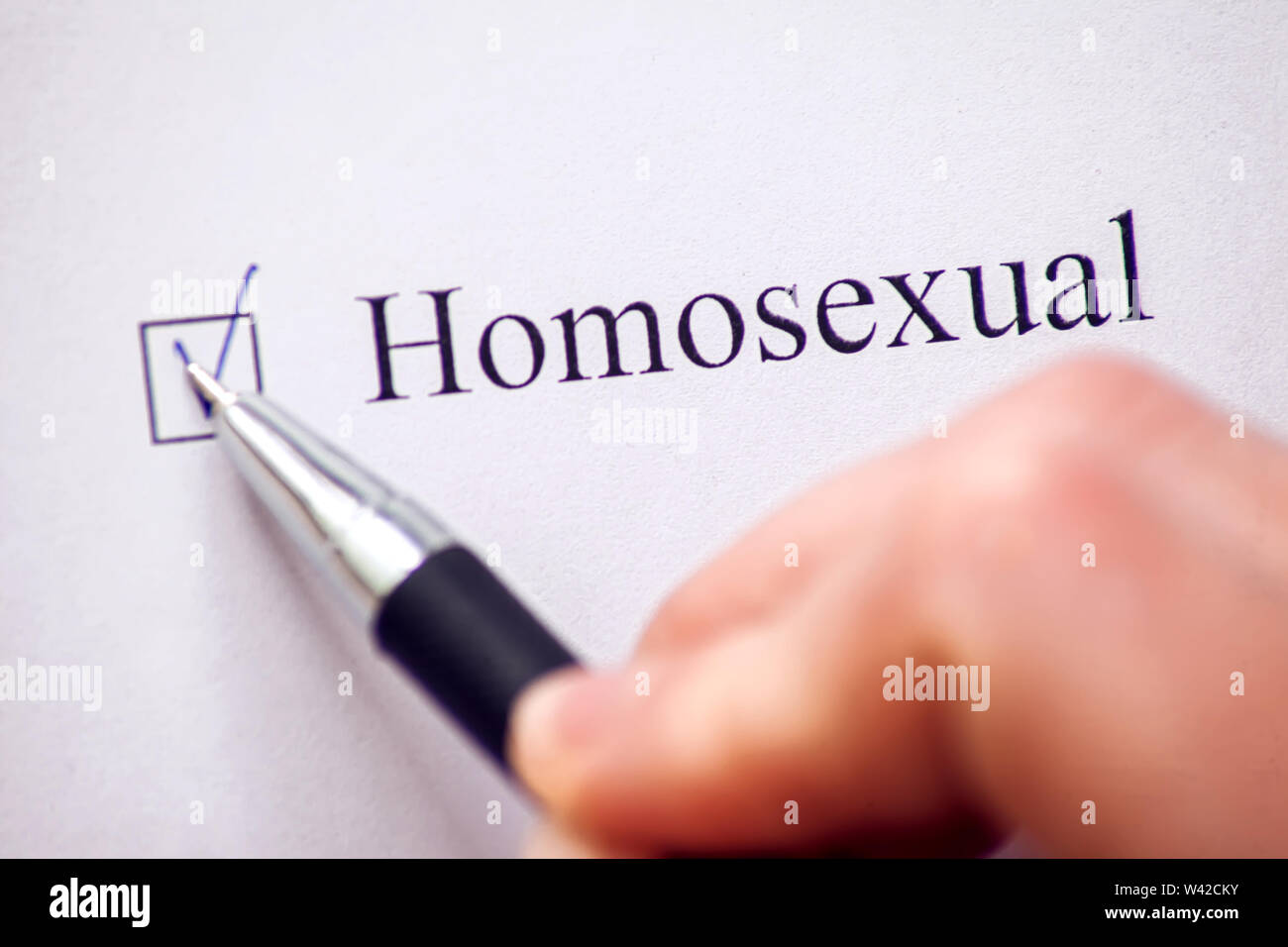 Checklist with a word Homosexual on white paper with pen. Checkbox ...