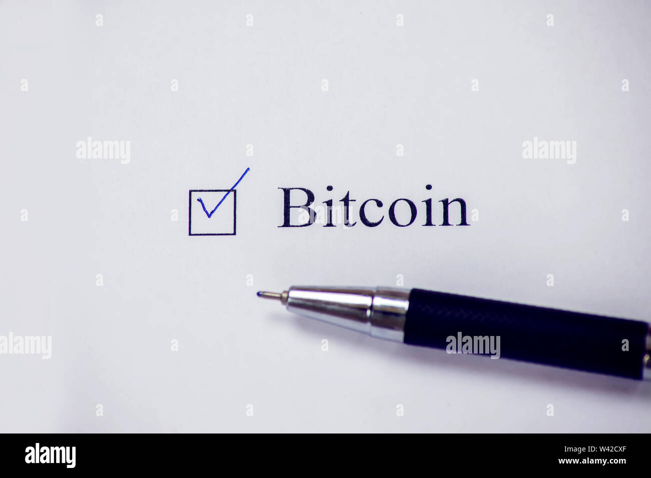 Checklist box - Bitcoin word on white paper. Check form and ...