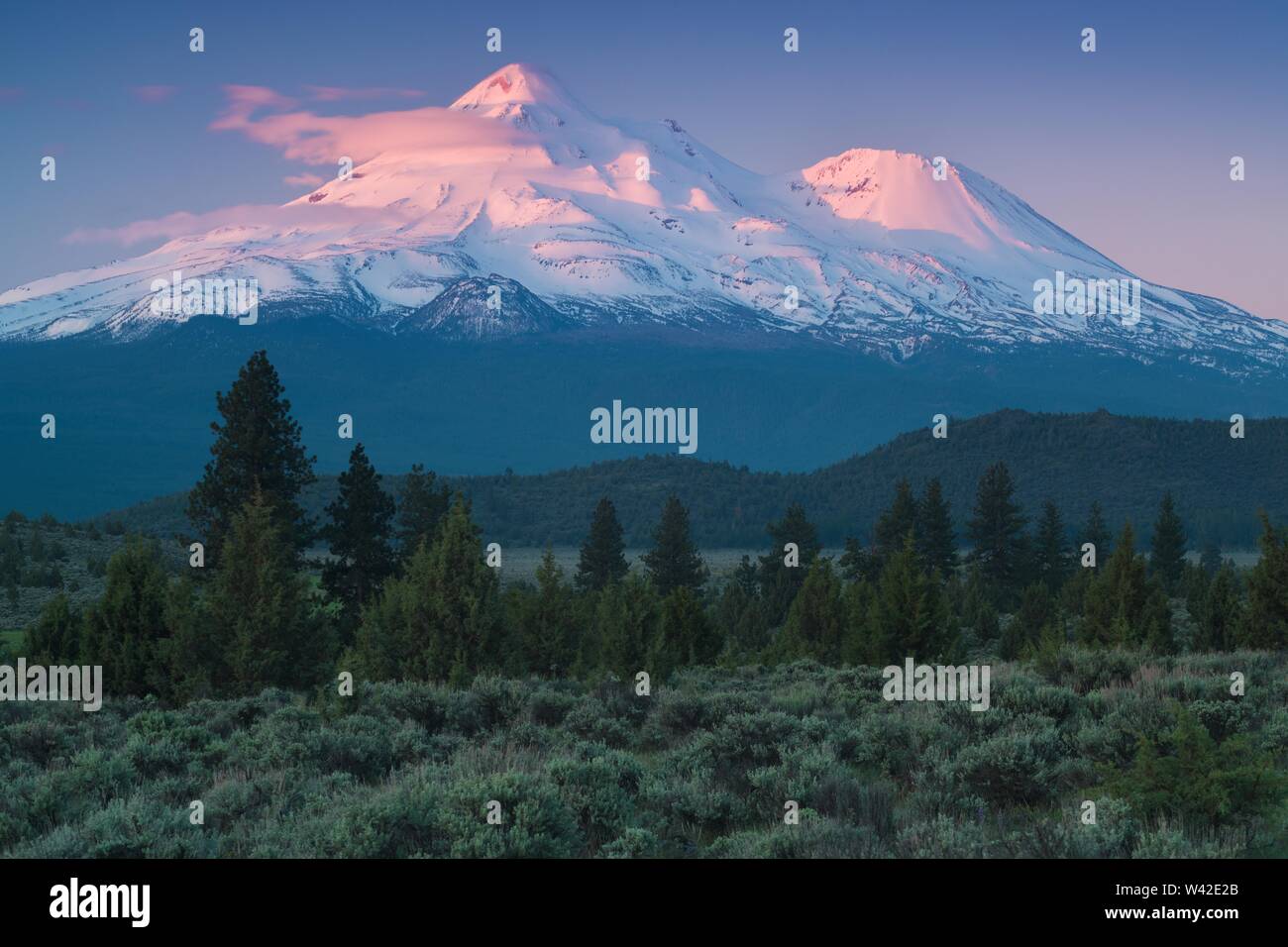 Classical view of Mount Shasta Volcano with glaciers, in California ...