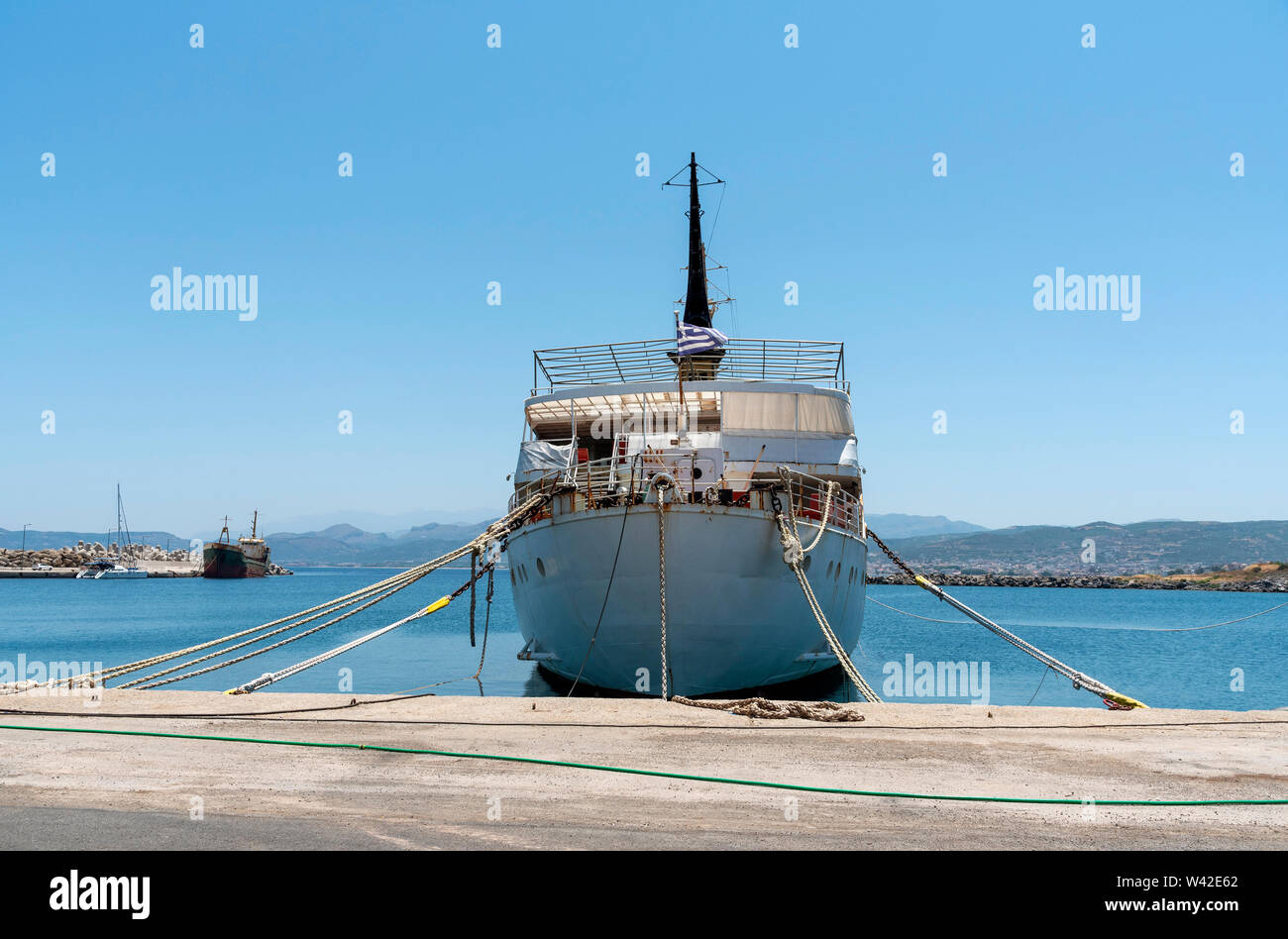 Kissamos Port, Kastelli, Crete, Greece. June 2019. An old ferry in a ...