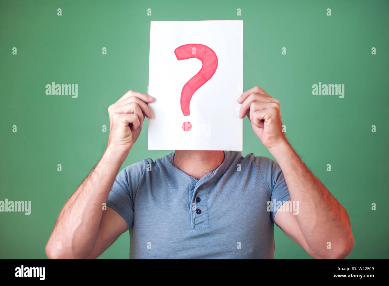 Funny young guy question mark hi-res stock photography and images - Alamy