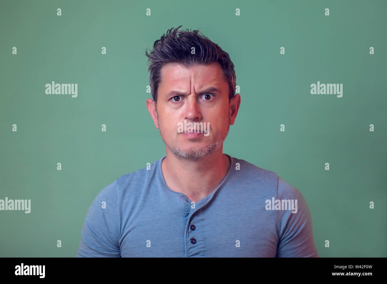 Frowning man hi-res stock photography and images - Alamy
