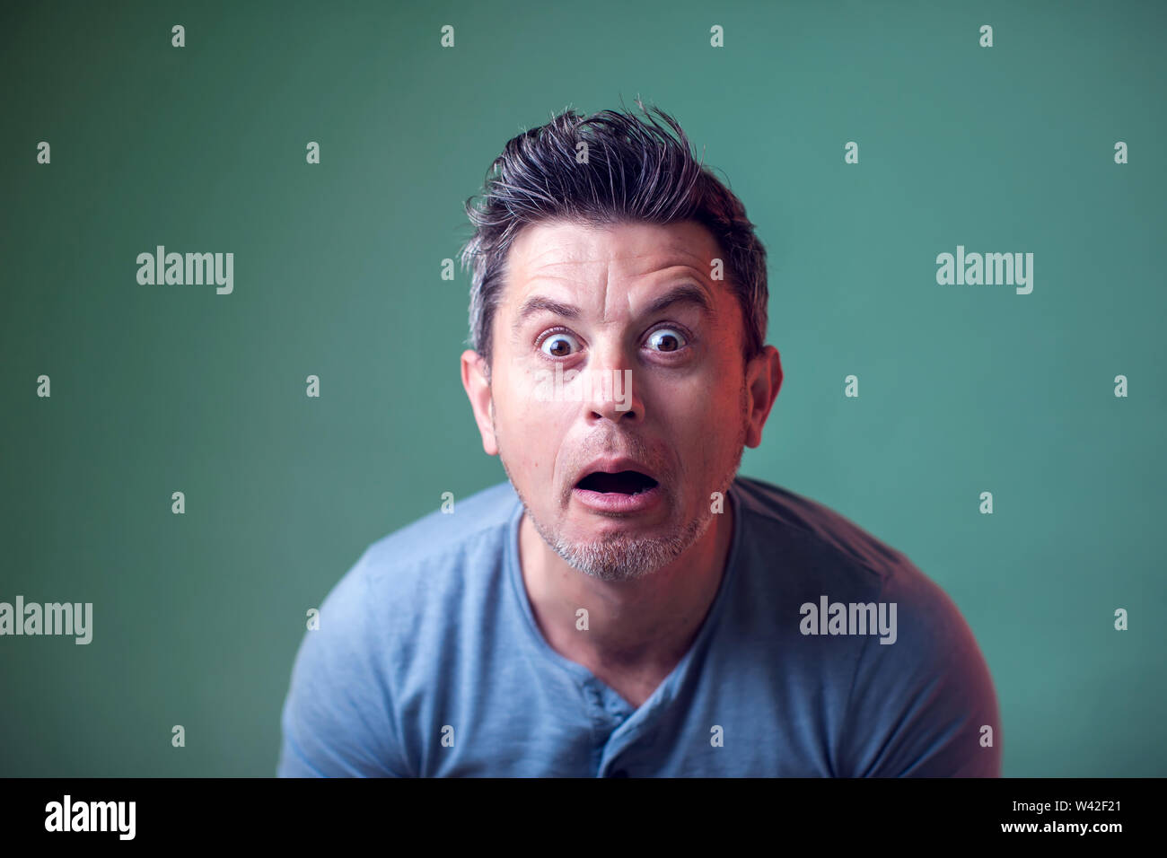 Closeup portrait of shocked surprised or scared young man. People ...