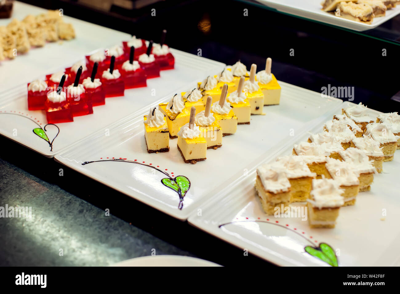 Close up delicious dessert pastry cakes in the hotel. Fresh colourful ...