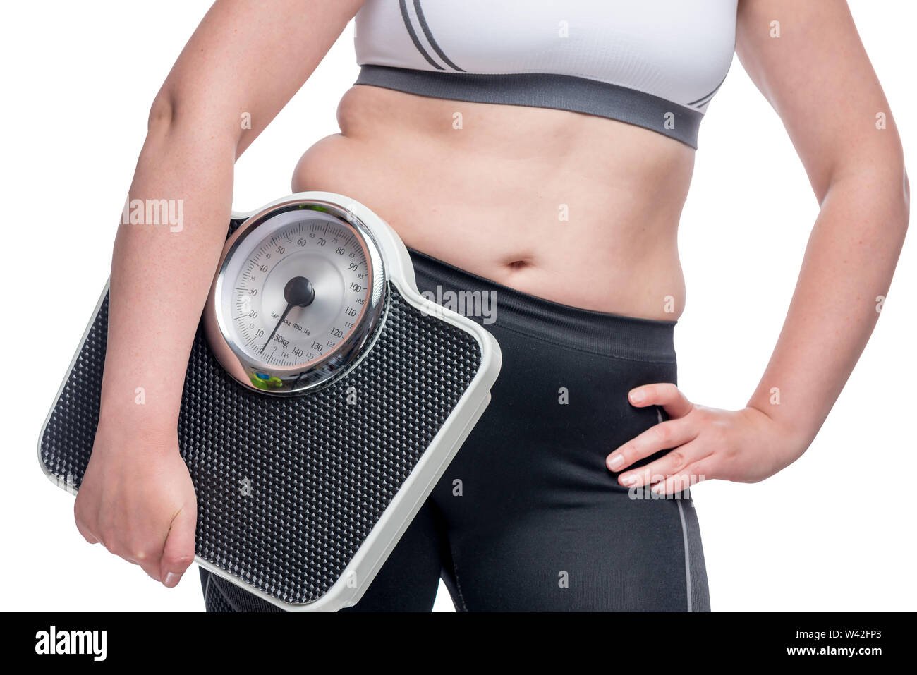 Concept photo of striving for the perfect figure, woman with weights ...