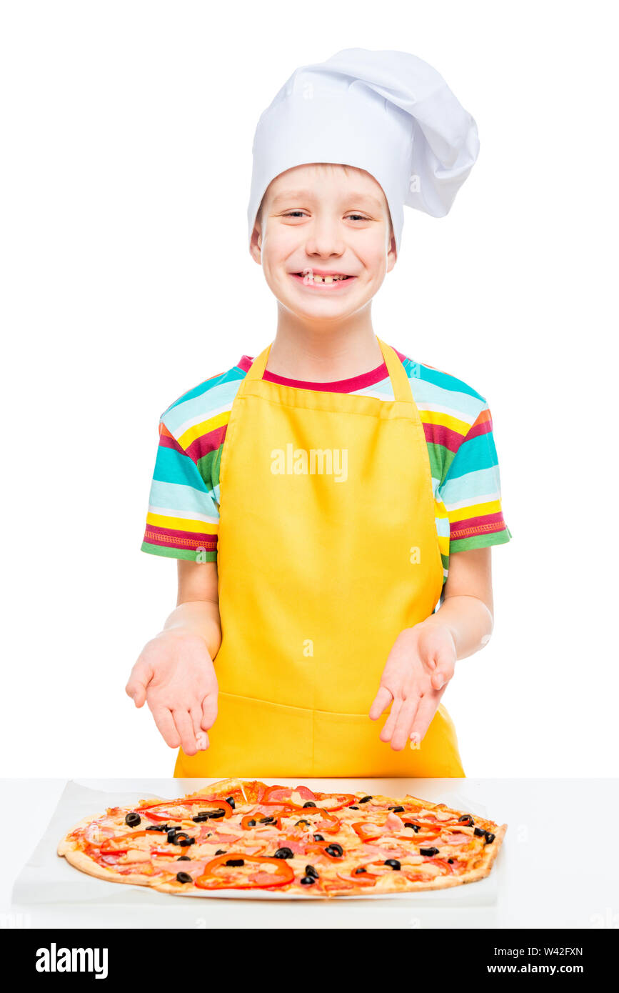 boy cook prepared pizza from natural ingredients, portrait in studio ...