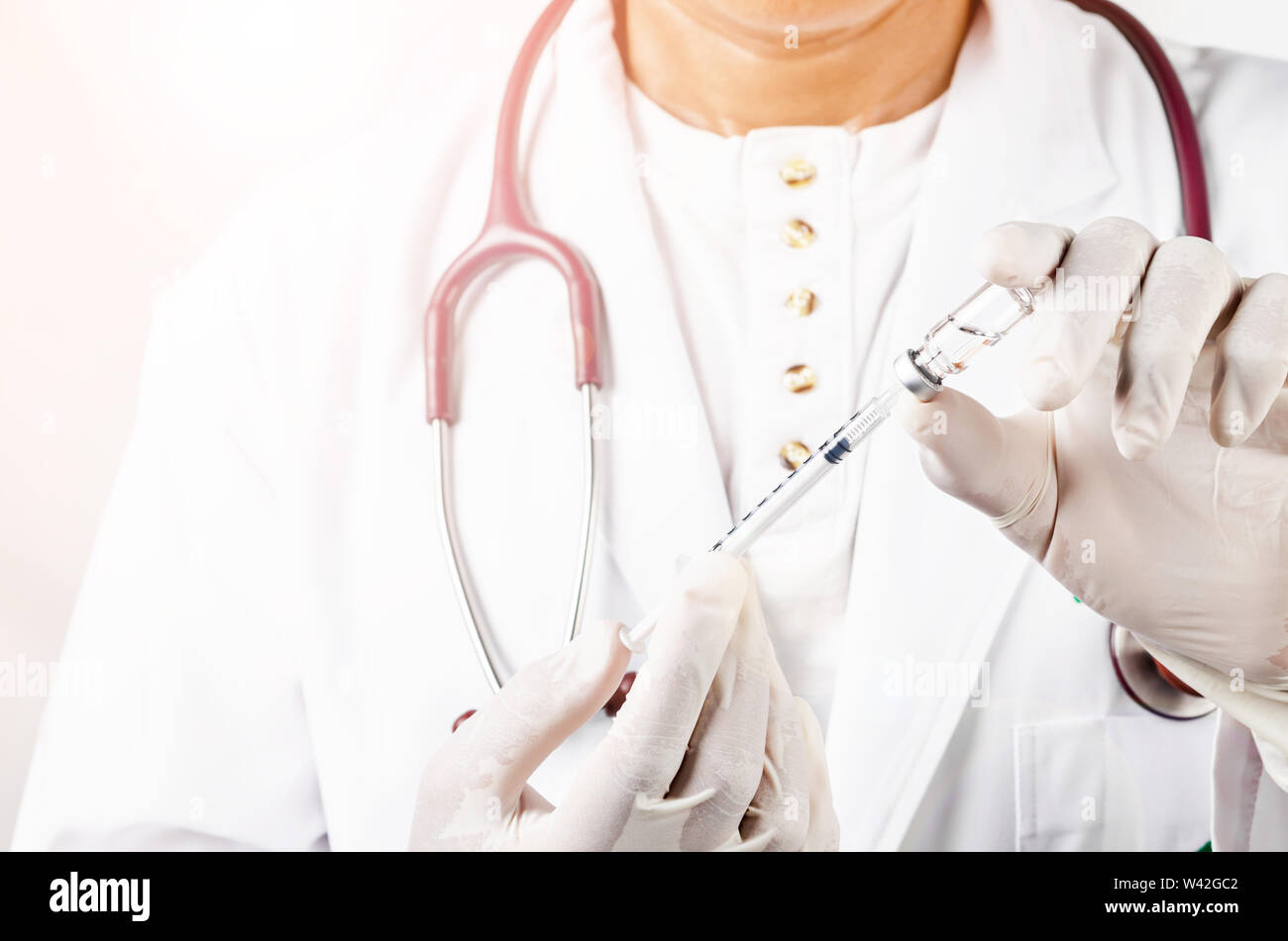 Injecting vaccination medicine on man doctor, medical concept Stock ...