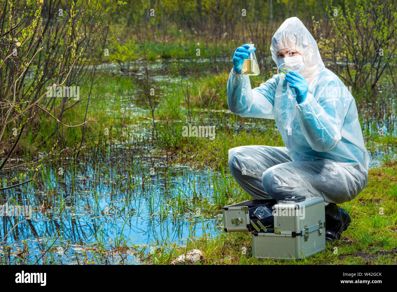 Female scientist water sample hi-res stock photography and images - Alamy