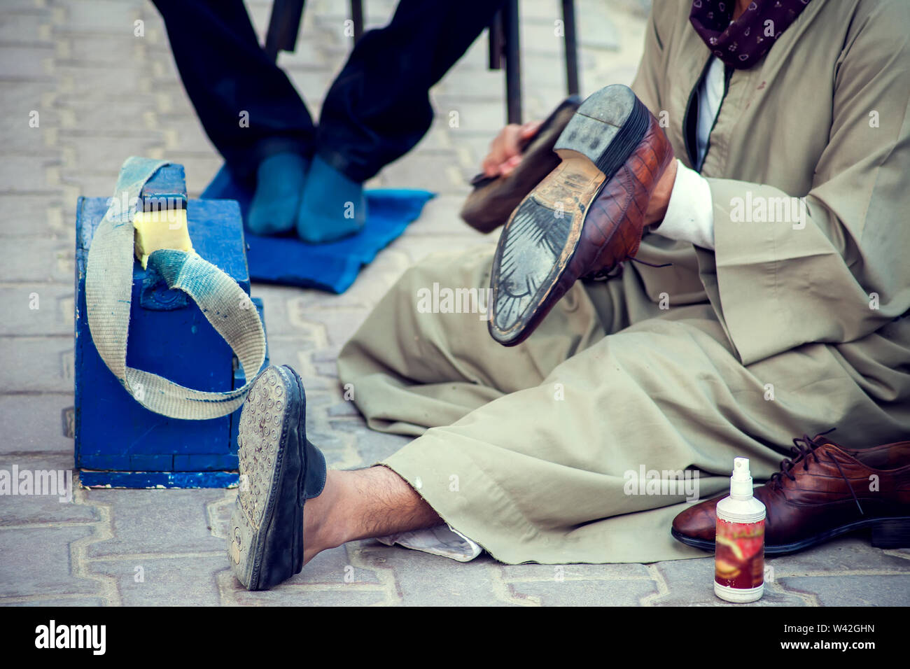 Polishing shoes man hi-res stock photography and images - Alamy