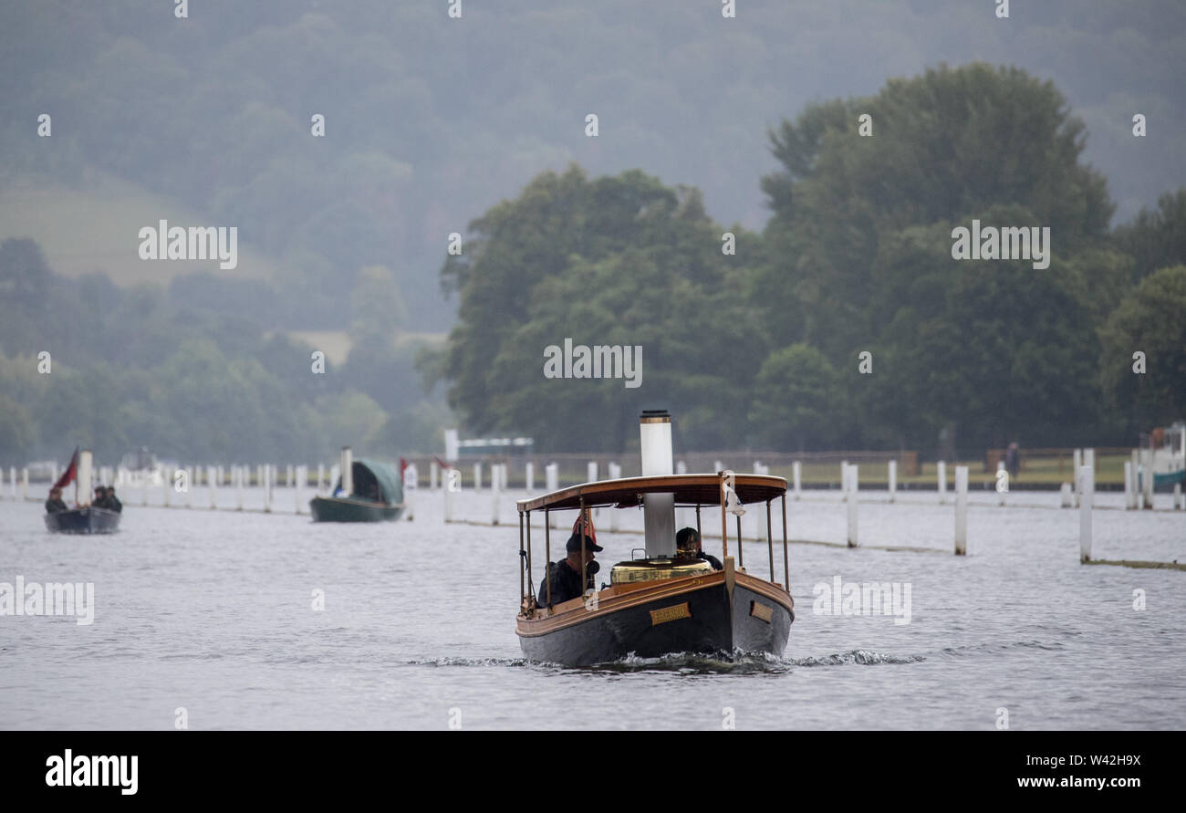 Members of the Steam Boat Association parade along the river Thames ...