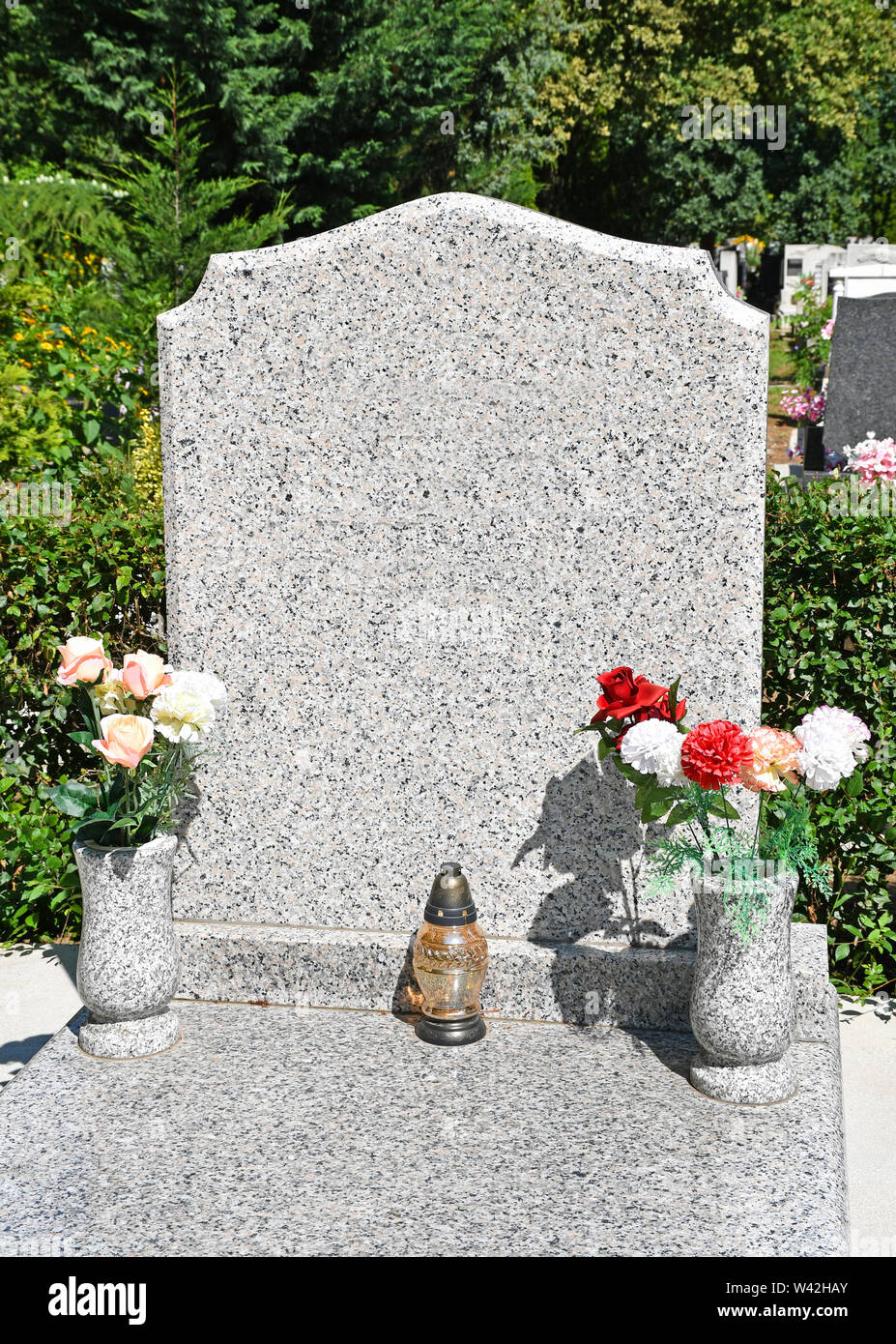 Tombstone in the public cemetery Stock Photo - Alamy