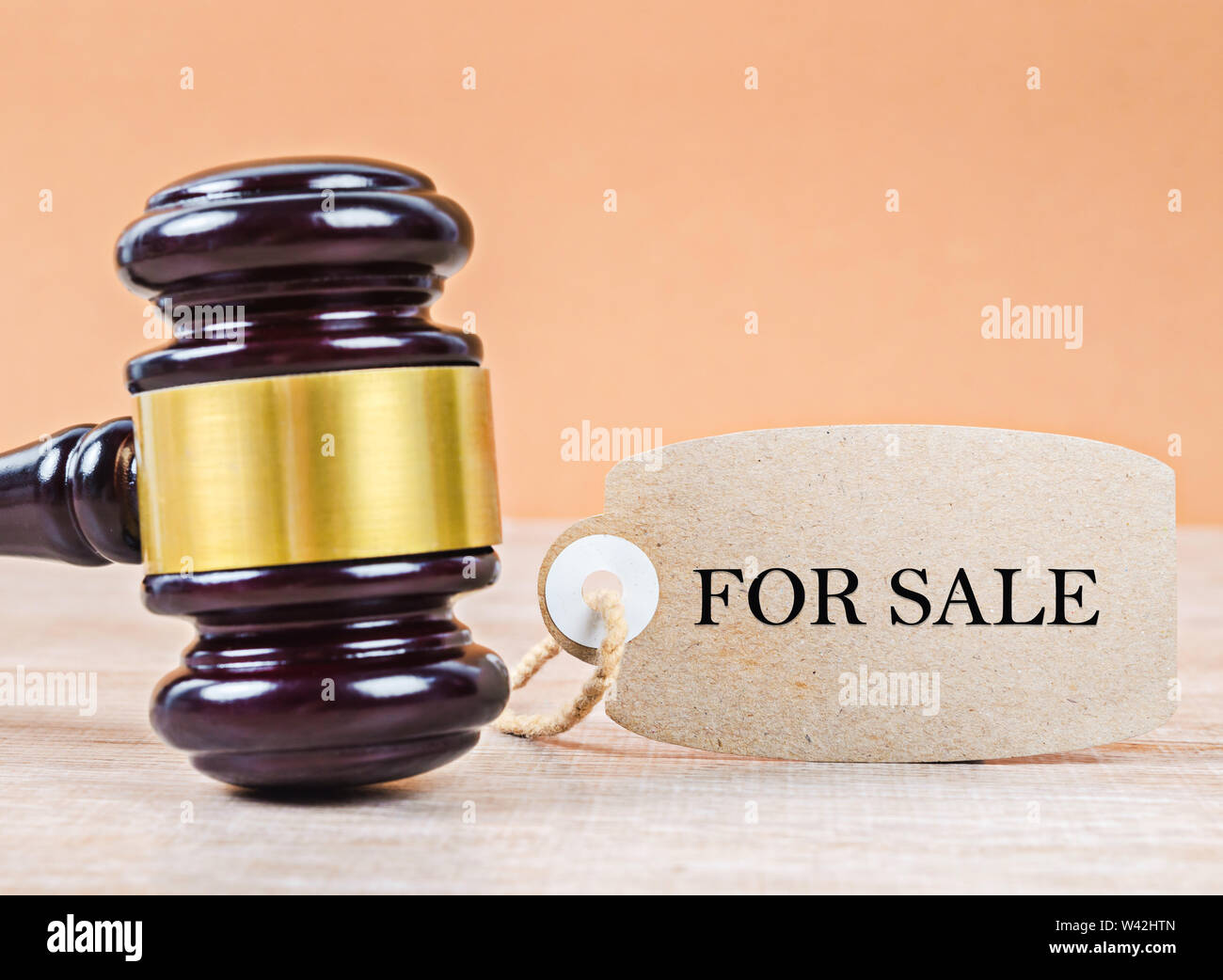 Wooden gavel with FOR SALE paper tag on table. Auction concept Stock ...