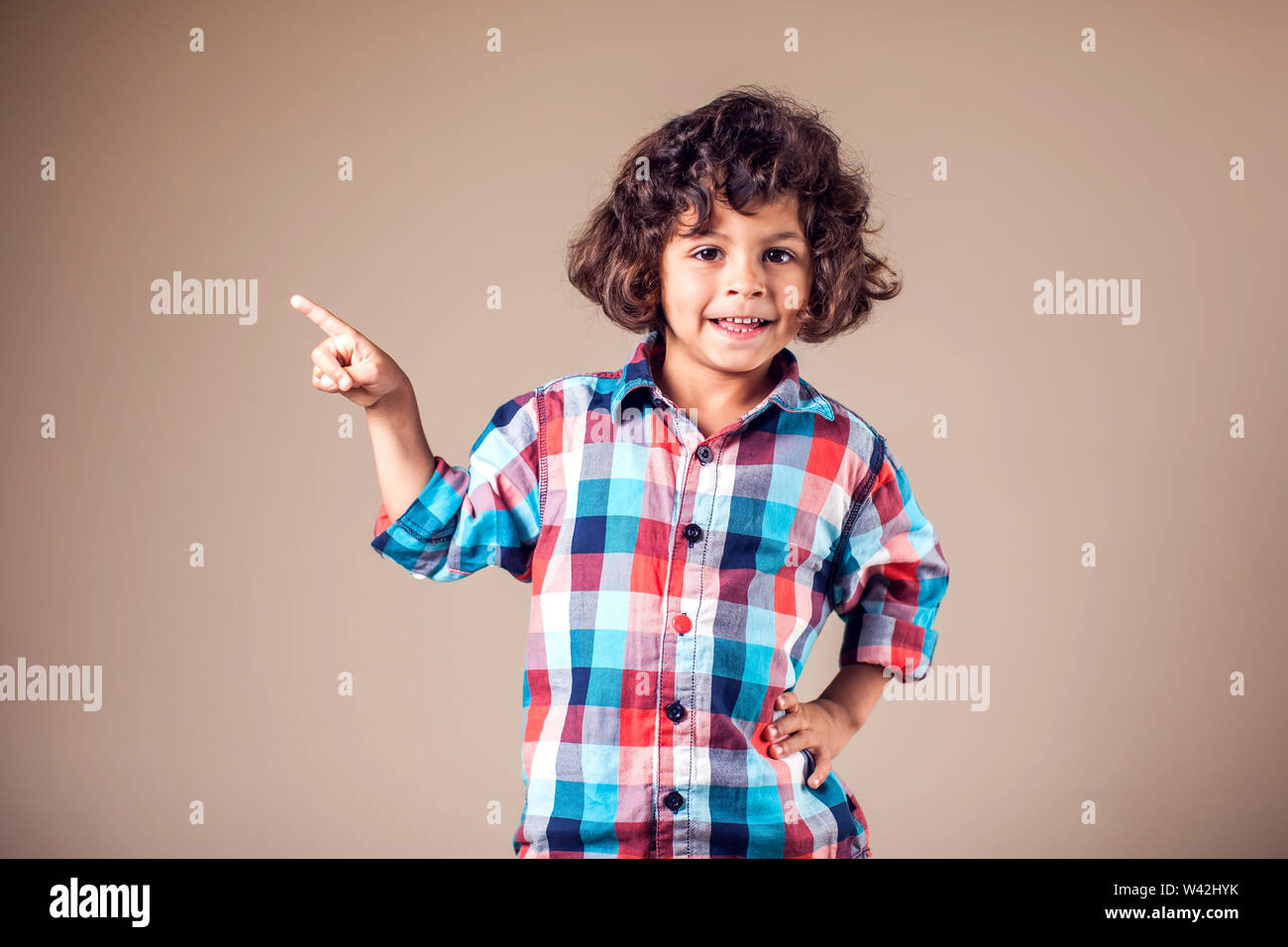 Little boy shows on something. Children, emotions concept Stock Photo ...