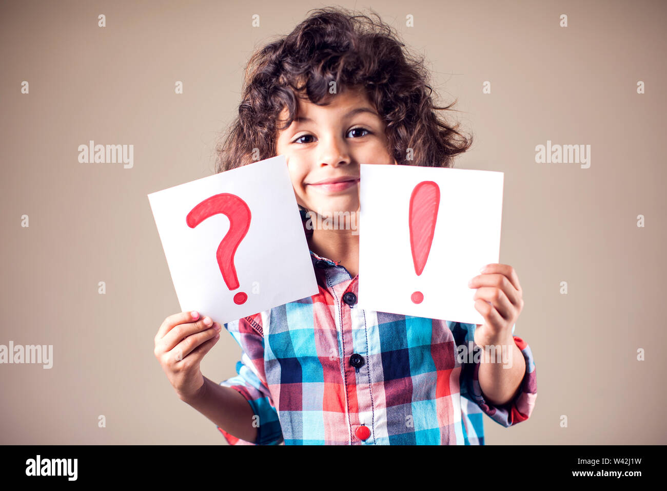 Kid thinking doubt hi-res stock photography and images - Alamy