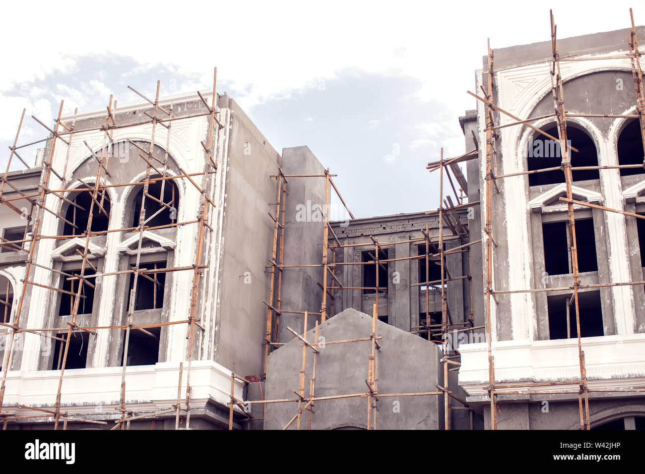 House with wooden scaffolding construction. Architecture and building ...