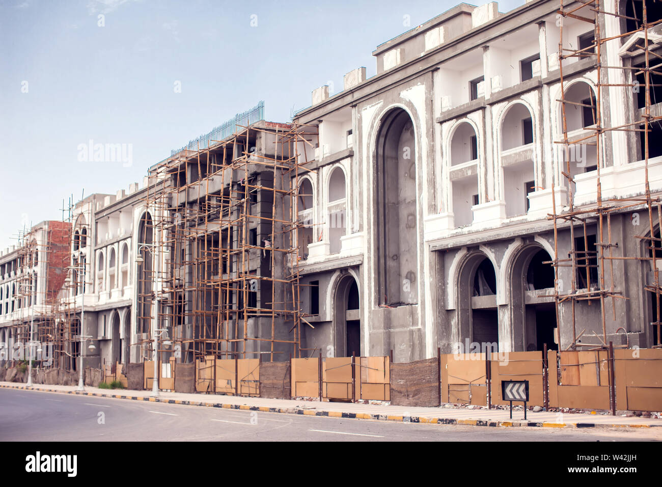 House with wooden scaffolding construction. Architecture and building ...