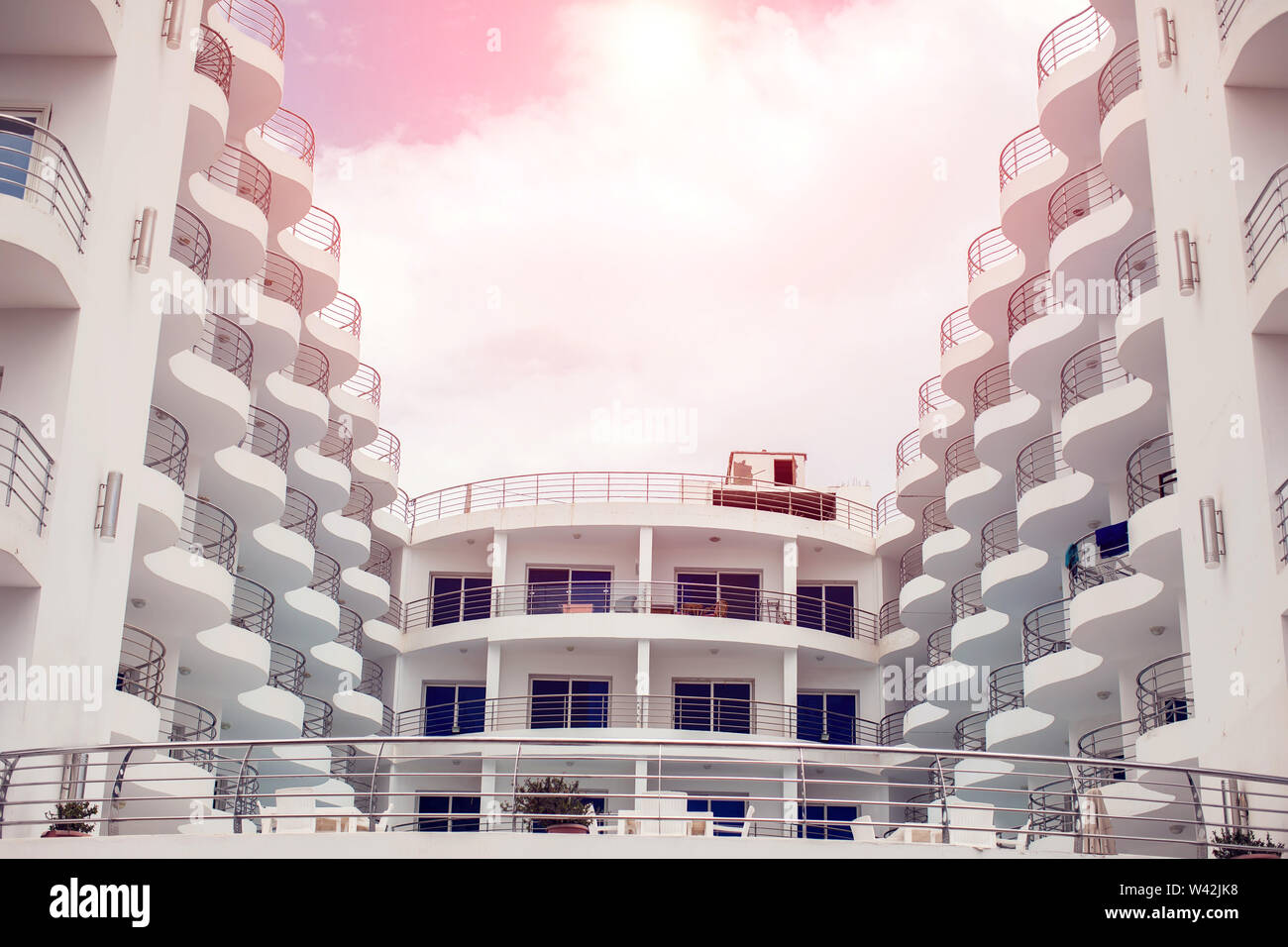 White color building with balcony. Architecture and design concept ...