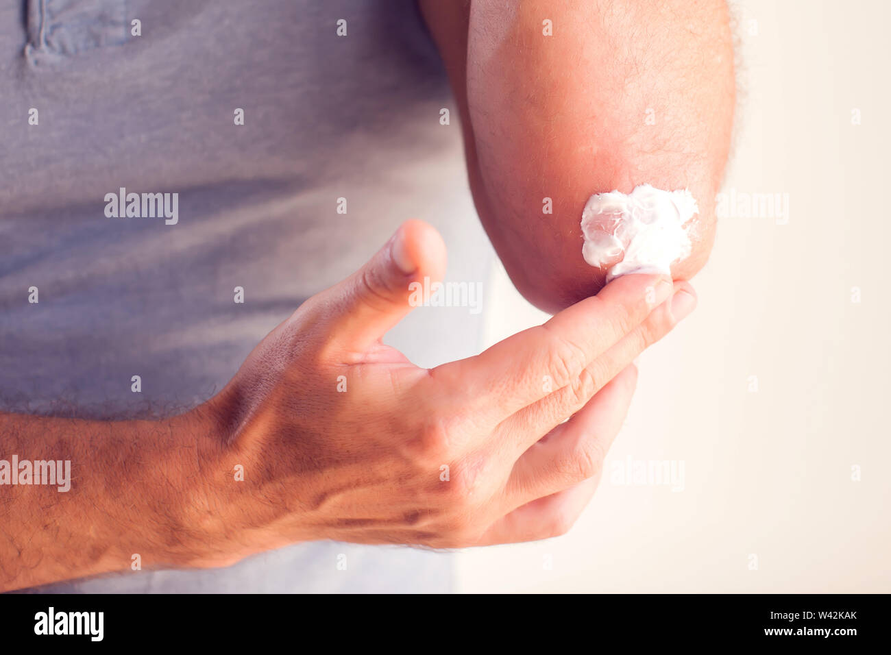 Person applies cream on hand hi-res stock photography and images - Alamy
