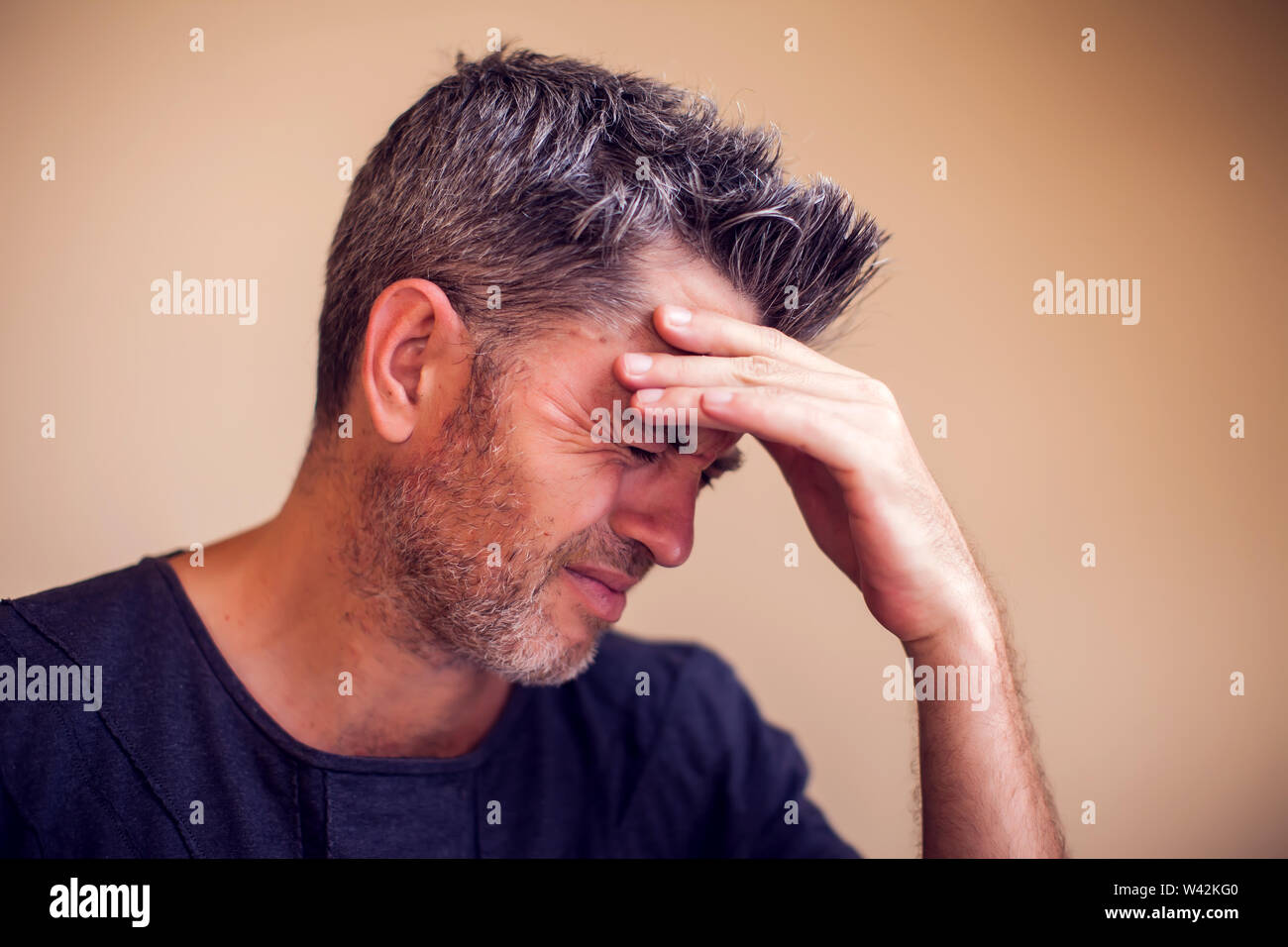 Man feels strong headache isolated. People, healthcare and medicine ...