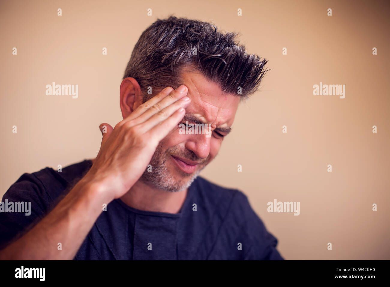 Man feels strong headache isolated. People, healthcare and medicine ...