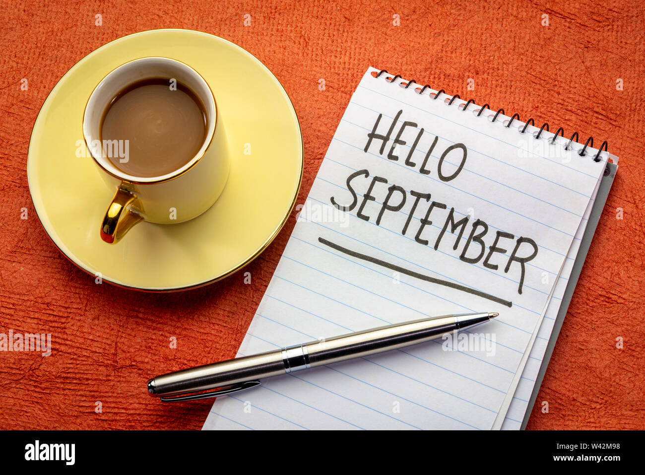 Hello September - handwriting in a notebook with a cup of coffee Stock ...