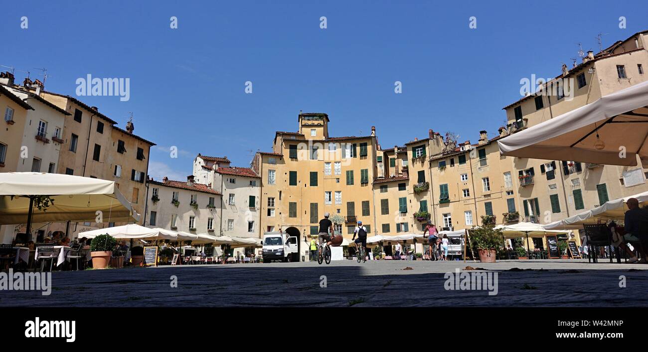Lucca, Italy - Famous Piazza Anfiteatro in the northeast quadrant of ...
