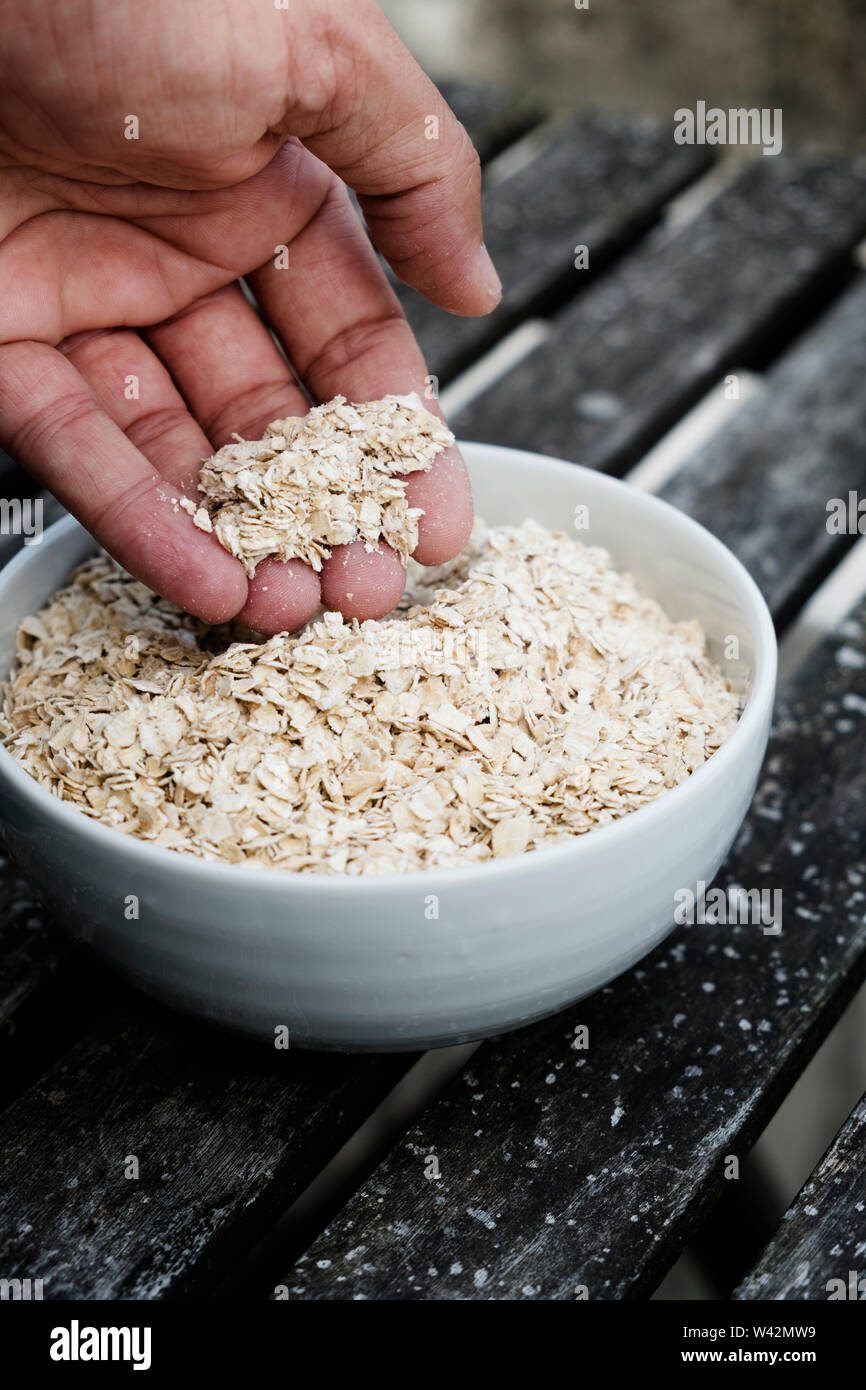 Fat man eating on the table hi-res stock photography and images - Alamy