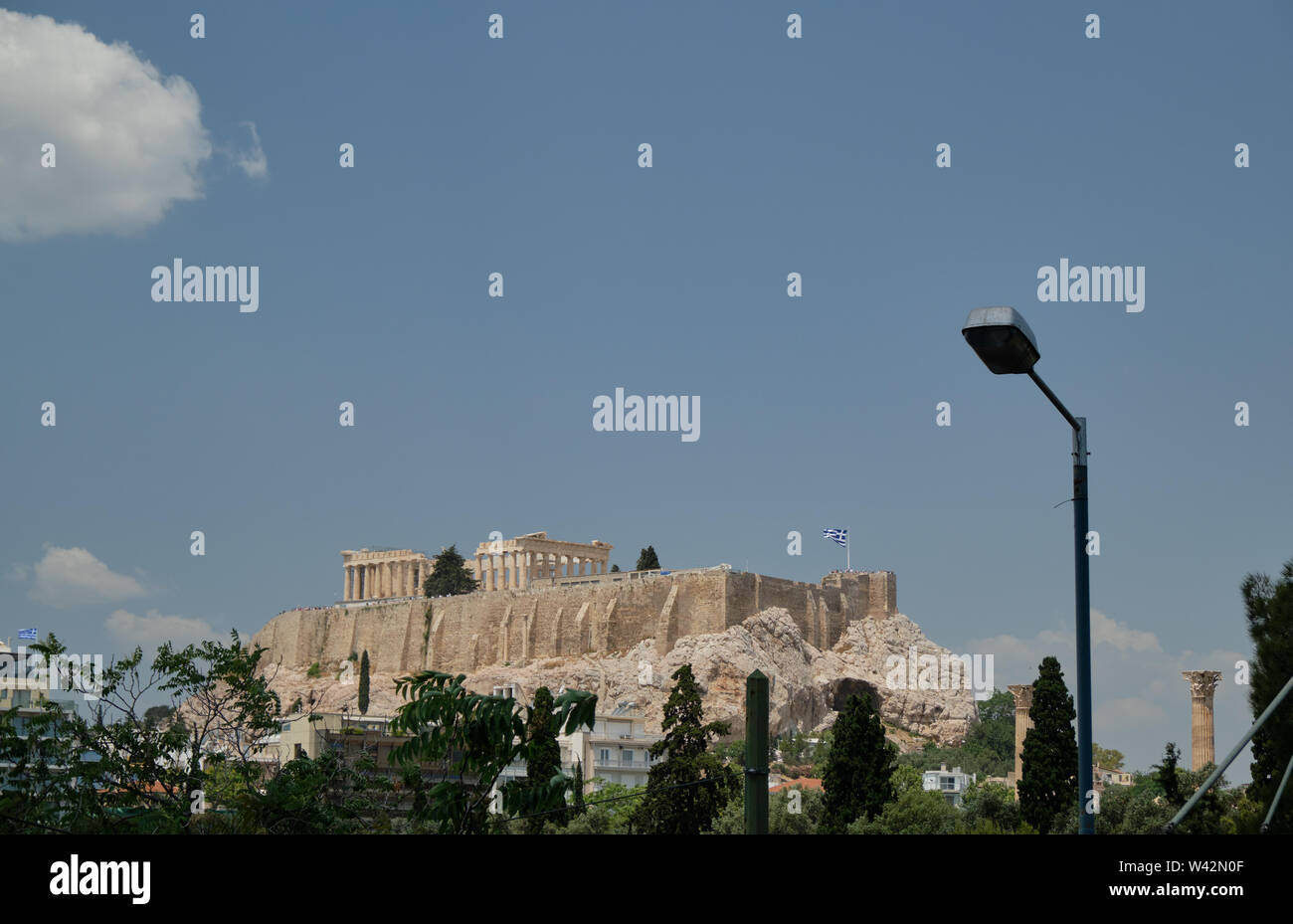 Ancient temple and clear blue sky and clouds in the Acropolis in a ...
