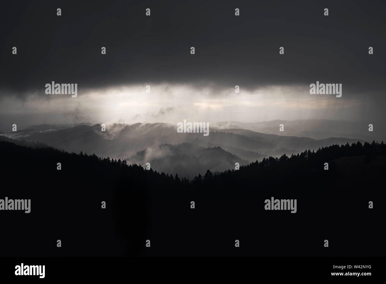 Cloud over hills hi-res stock photography and images - Alamy