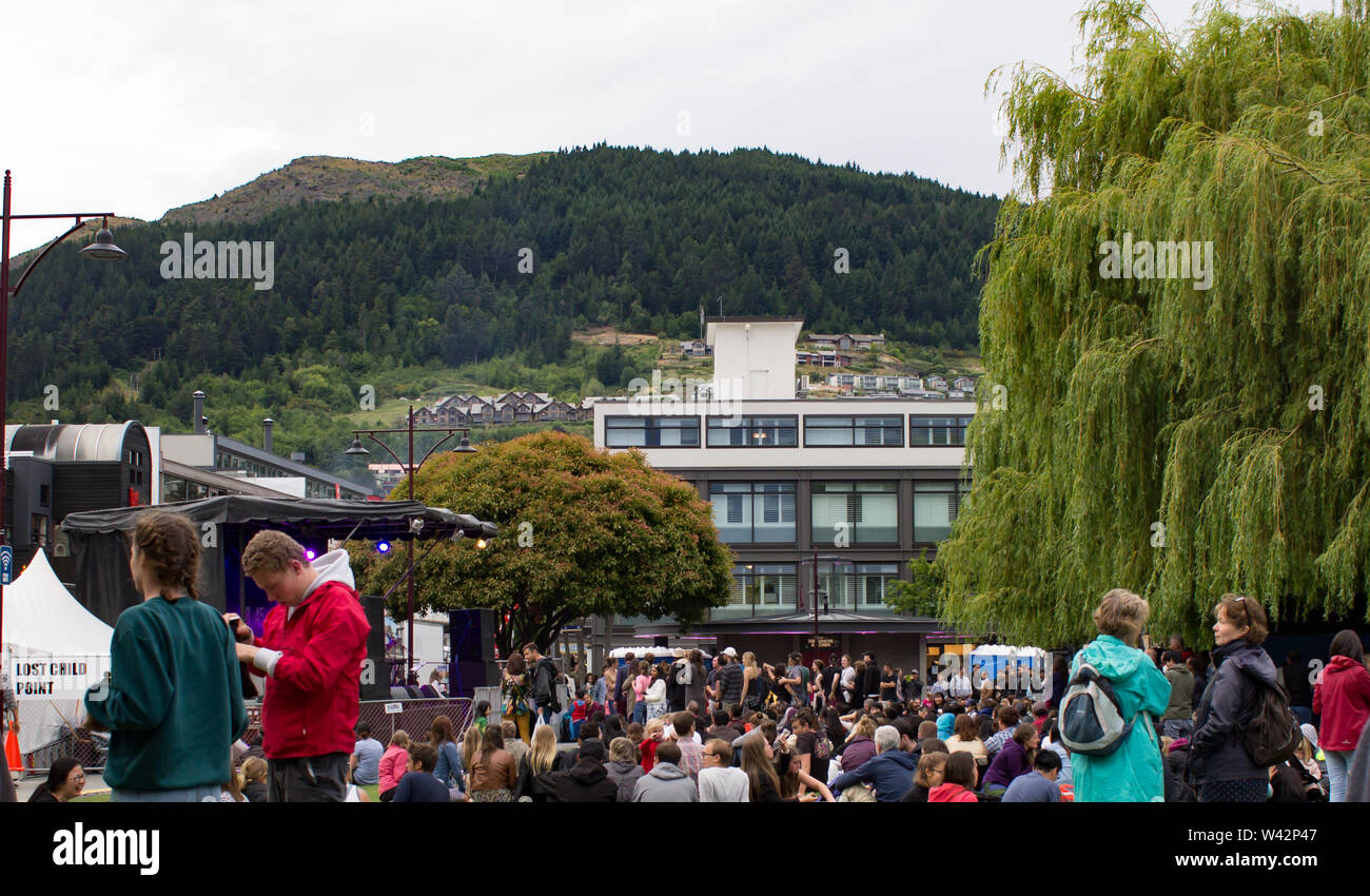 Crowd at a concert in the park in Queenstown, New Zealand Stock Photo ...